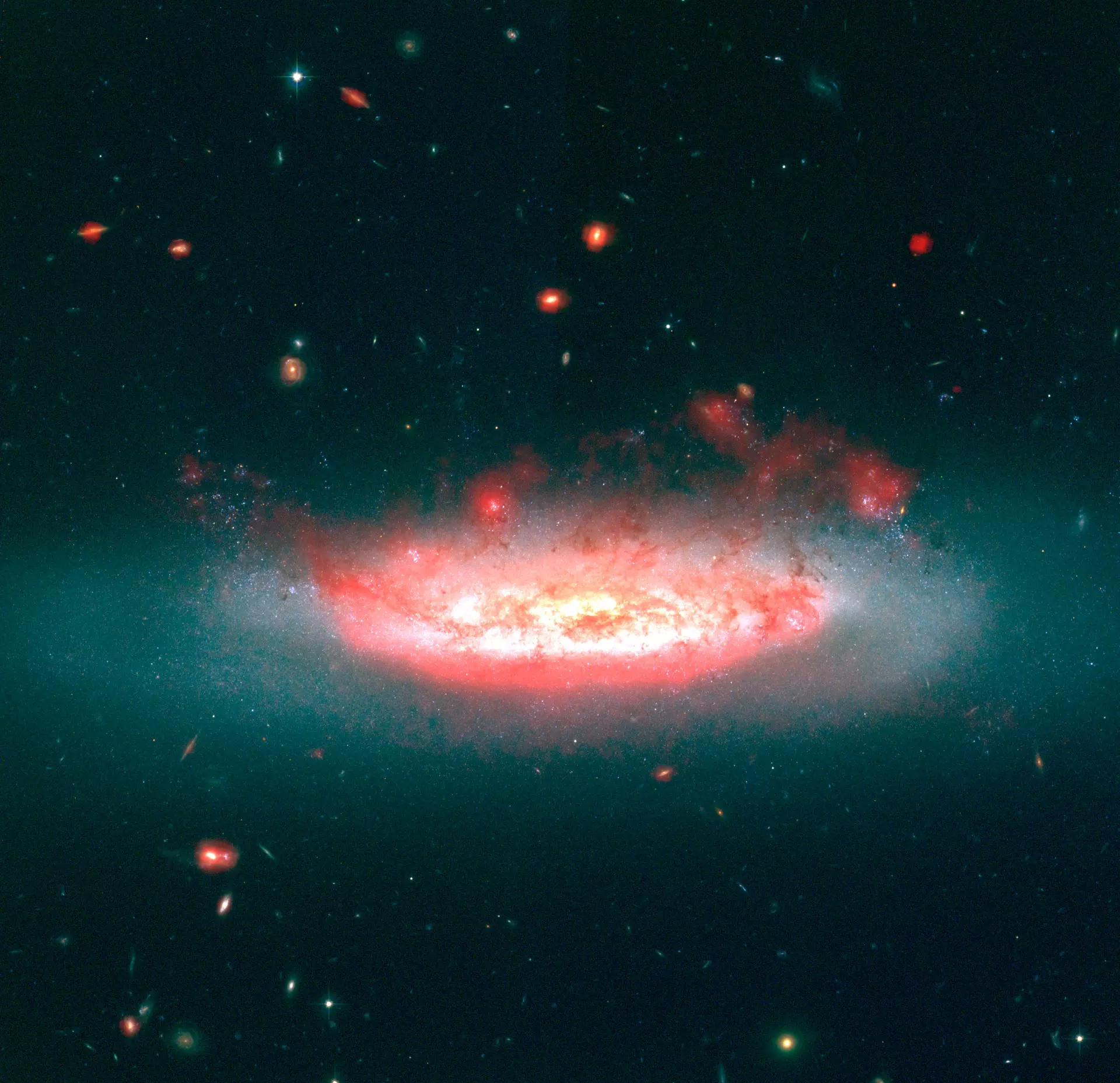 Галактикааралық «жел» галактикаларды жұлдыз түзетін газды жұлып тастайтынының алғашқы тікелей дәлелі