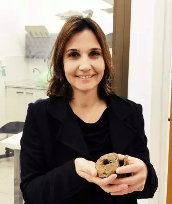 Dr. Hila May